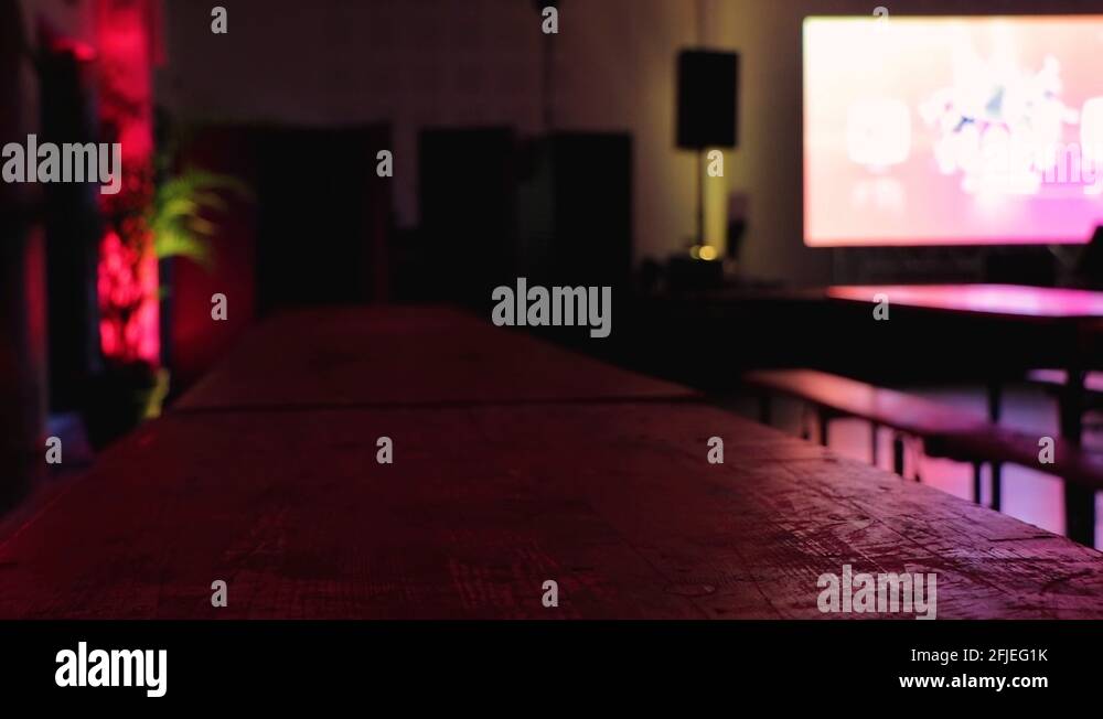 Mexican themed party hall with a small stage with big screen and ...