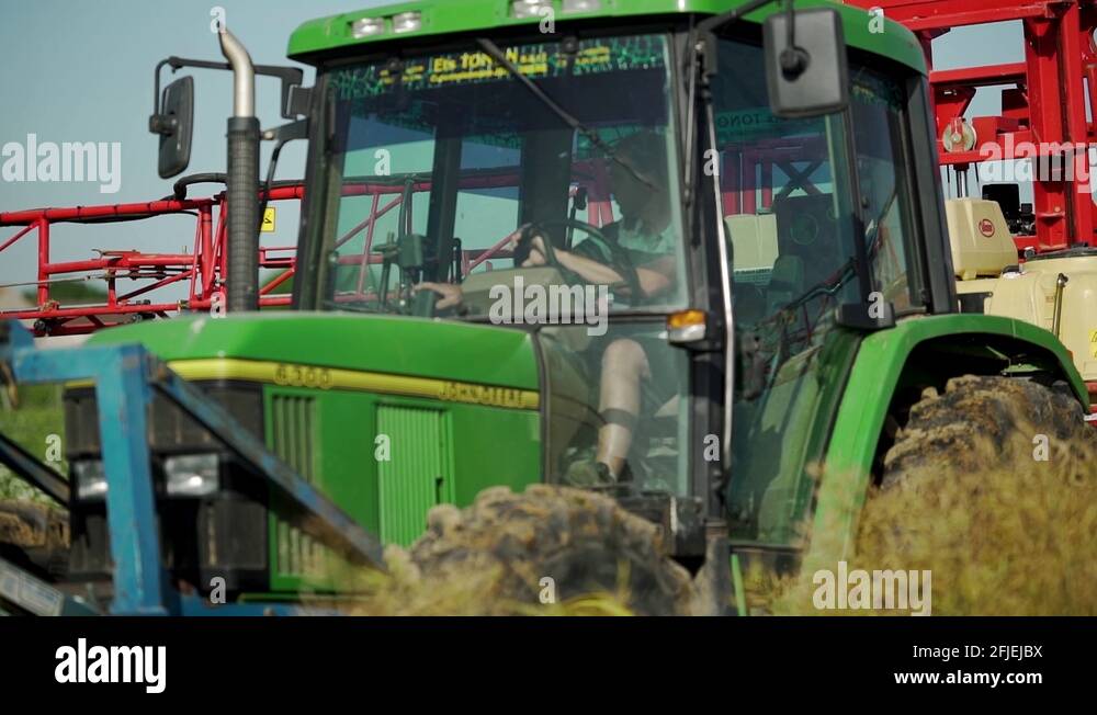 Tractor driver Stock Videos & Footage - HD and 4K Video Clips - Alamy