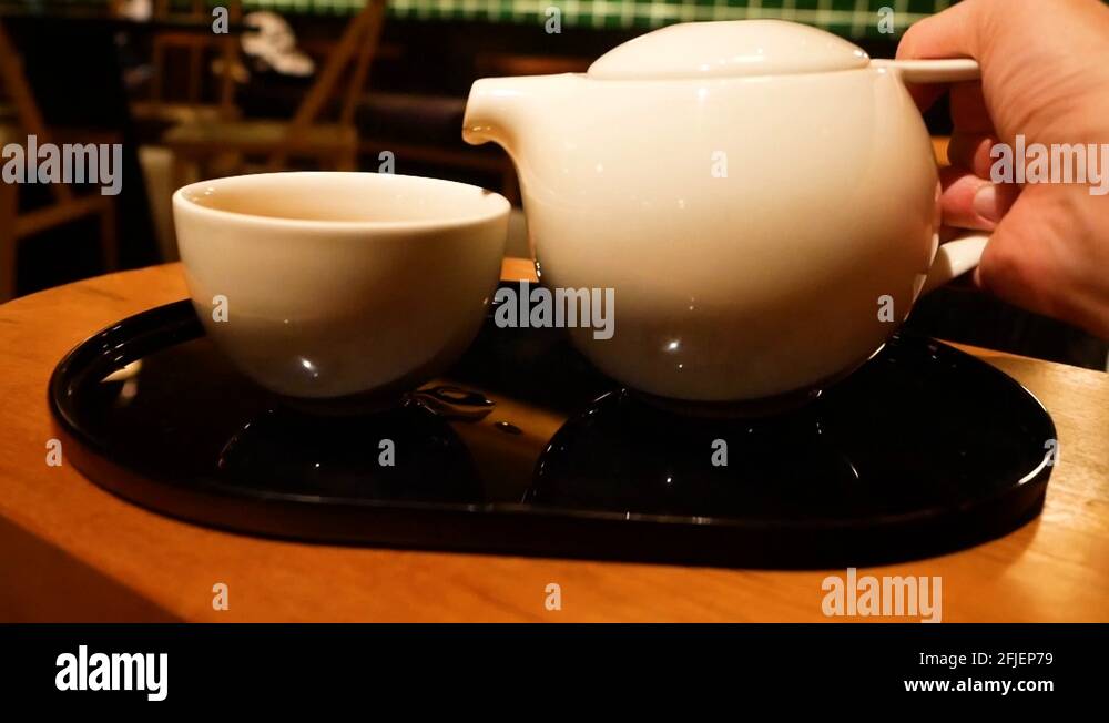 Man serving tea Stock Videos & Footage - HD and 4K Video Clips - Alamy
