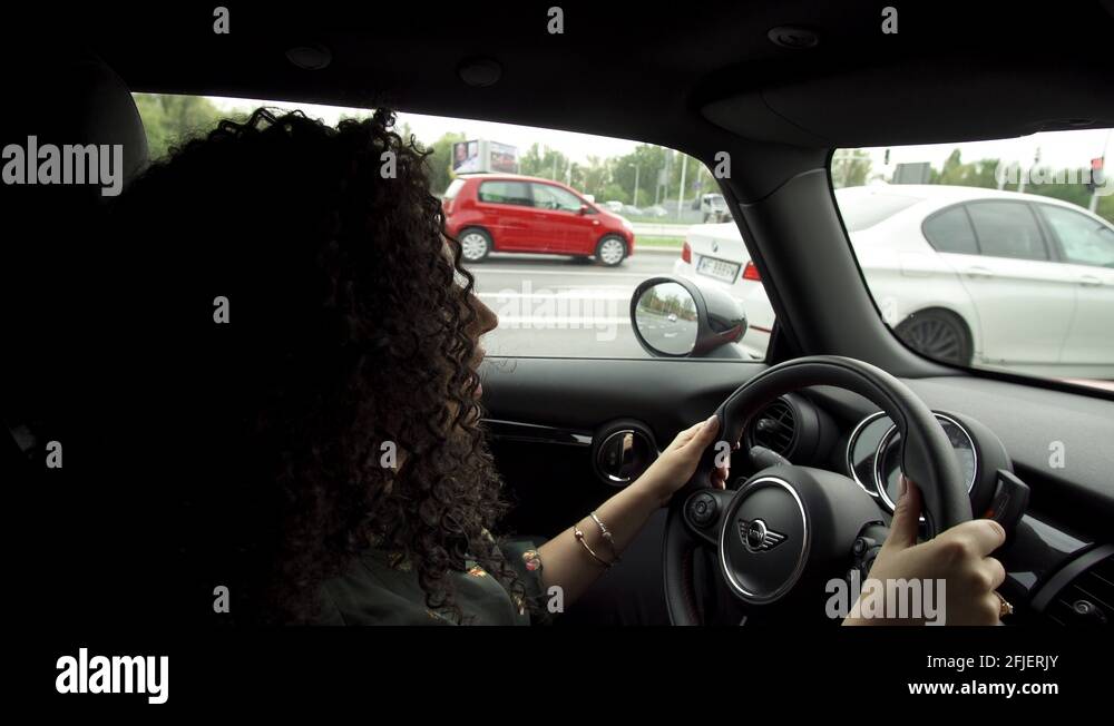 Woman driving mini car Stock Videos & Footage - HD and 4K Video Clips ...