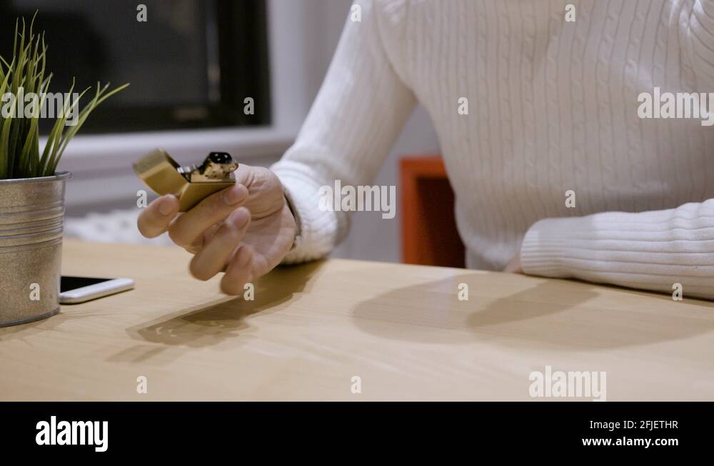 Desk lighter Stock Videos & Footage - HD and 4K Video Clips - Alamy