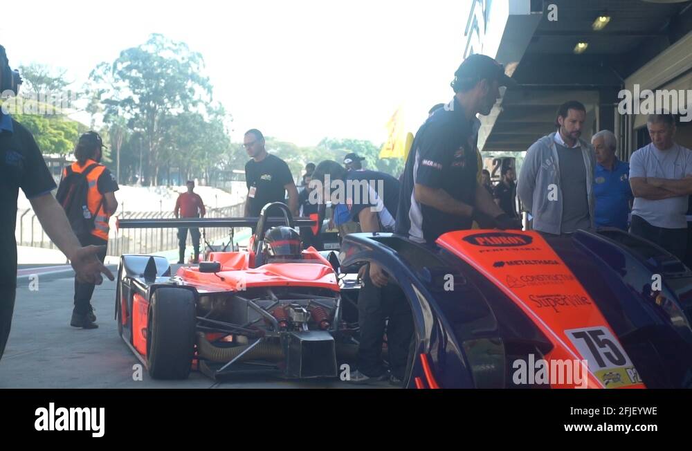 Mechanics working on race car Stock Videos & Footage - HD and 4K Video ...