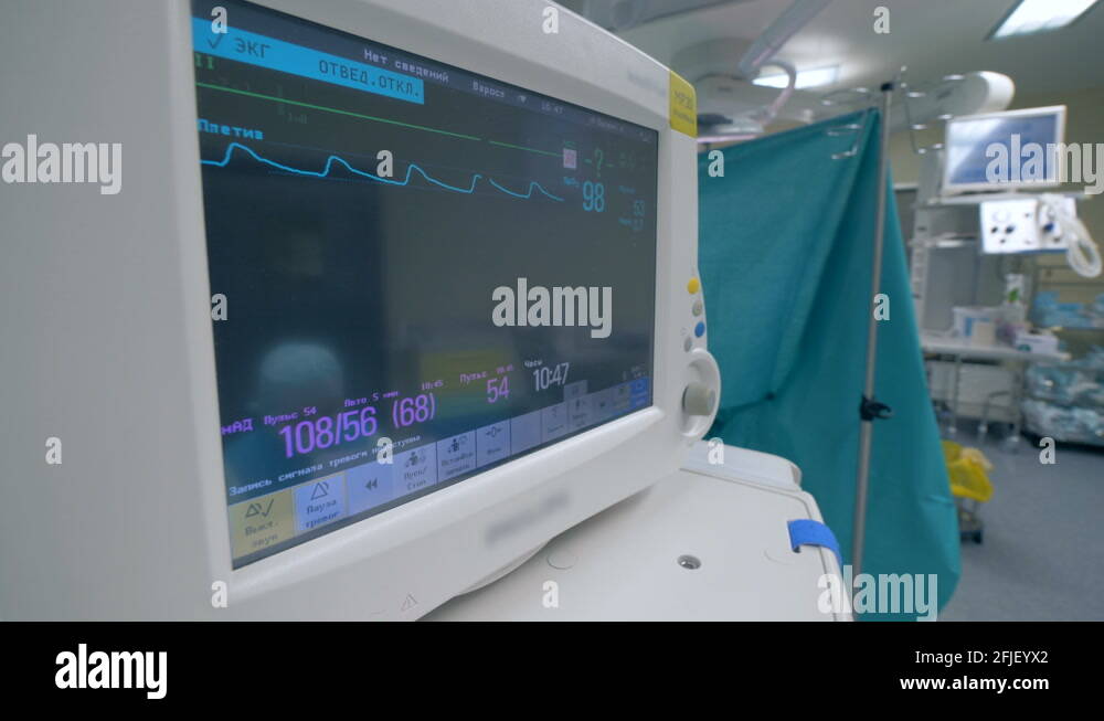 Functioning medical monitor showing vital signs during a surgery Stock ...