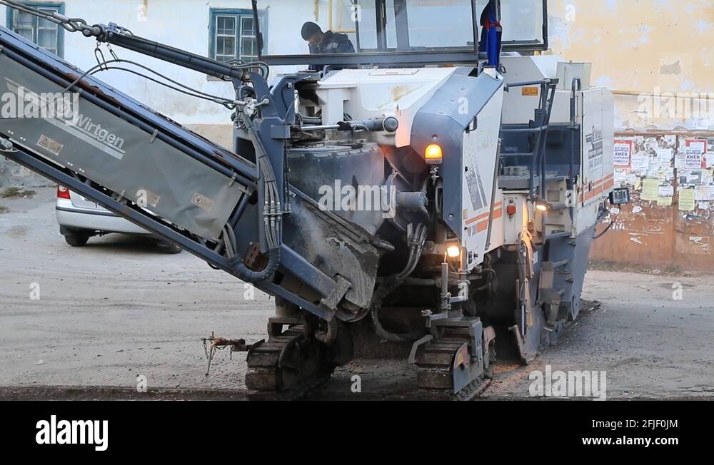 Tracked Road Milling Machine Removing Asphalt Stock Video Footage - Alamy