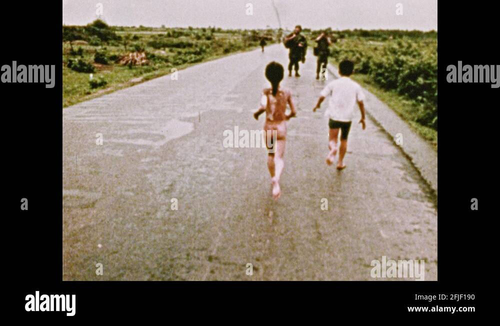 1970s: UNITED STATES: Girl drinks water. Napalm Girl in Vietnam. Rocket ...