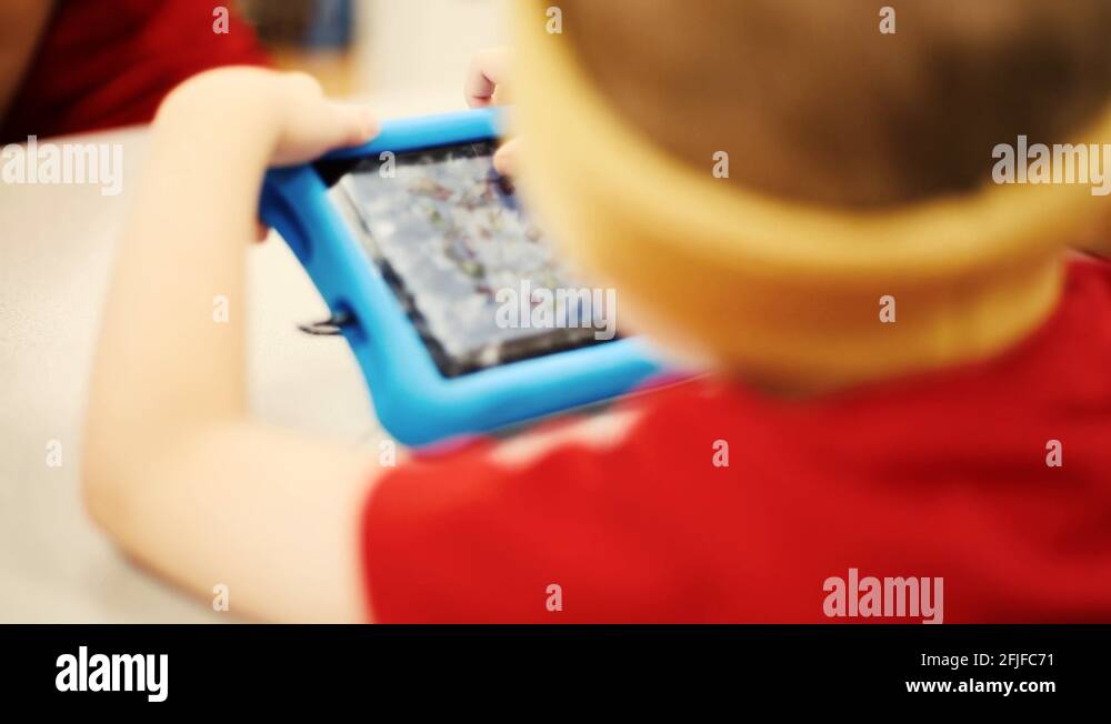 Kid with ipad Stock Videos & Footage - HD and 4K Video Clips - Alamy