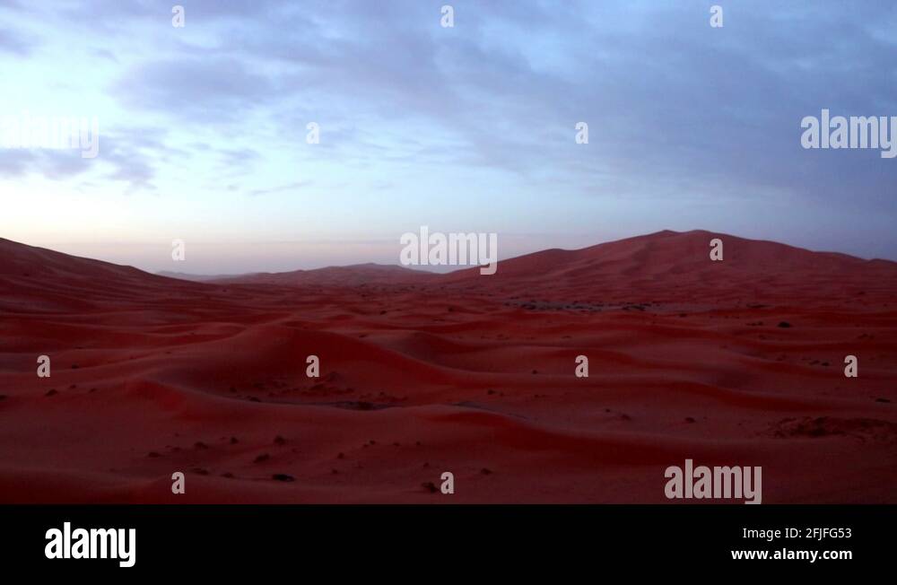 early morning view from the top of the sand dunes in the sahara dessert ...