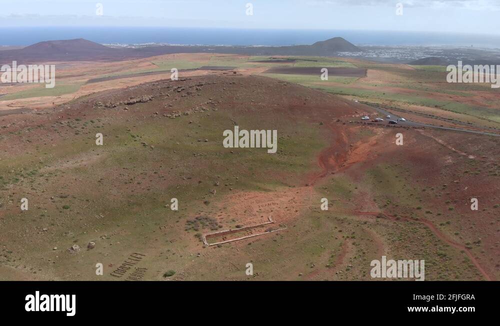 Descending behind a castle built on the rim of a volcano Stock Video ...
