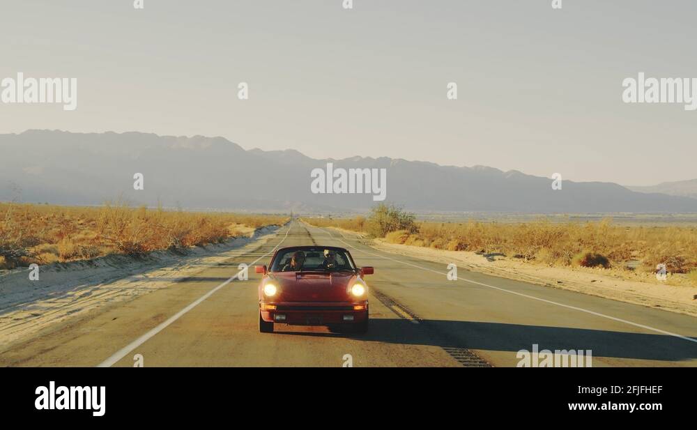 Couple in convertible driving in road Stock Videos & Footage - HD and ...