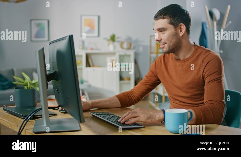 Handsome Software Engineer Works on a UX / UI Mobile App Template, Uses ...