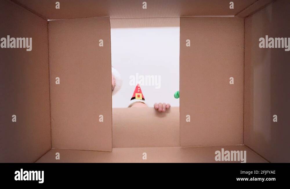 Family opening cardboard box Stock Video Footage - Alamy