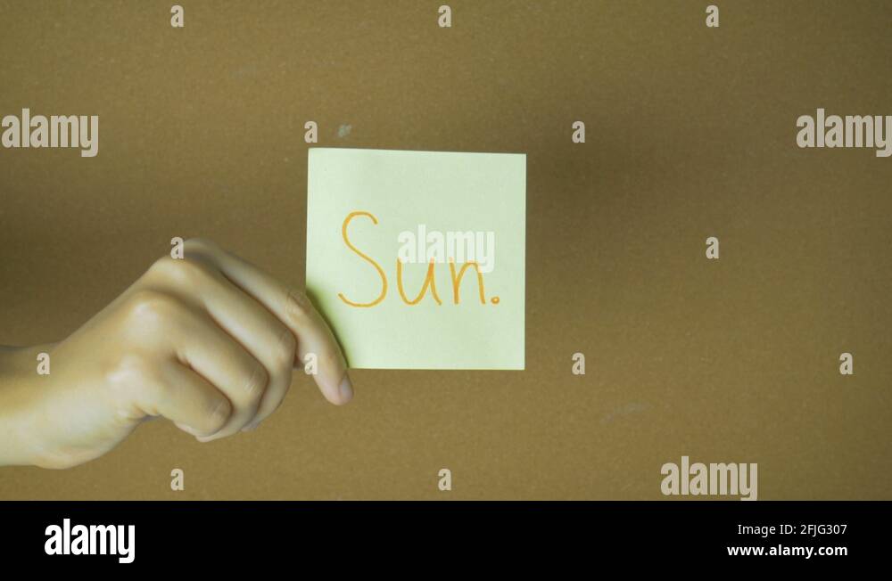 Days of week in motion. Hands passing each other sticky notes with ...