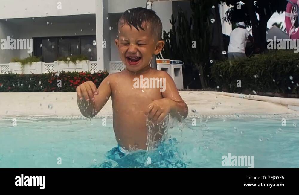 Splashing in the swimming pool Stock Videos & Footage - HD and 4K Video ...