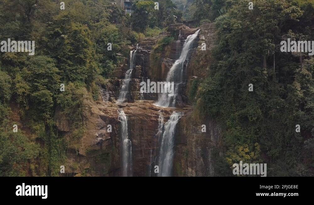 Stunning multi level waterfall cascading over a vertical cliff faces of ...