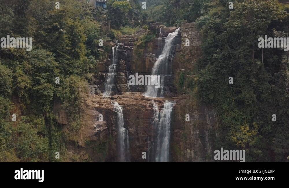 Stunning multi level waterfall cascading over a vertical cliff faces of ...