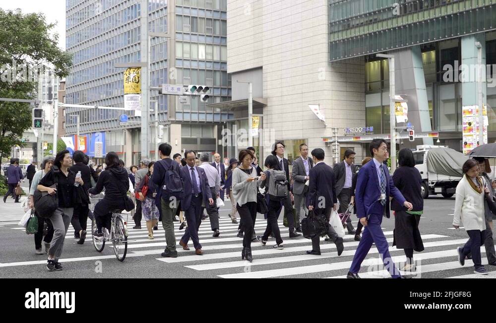 Asian men crossing the road Stock Videos & Footage - HD and 4K Video ...