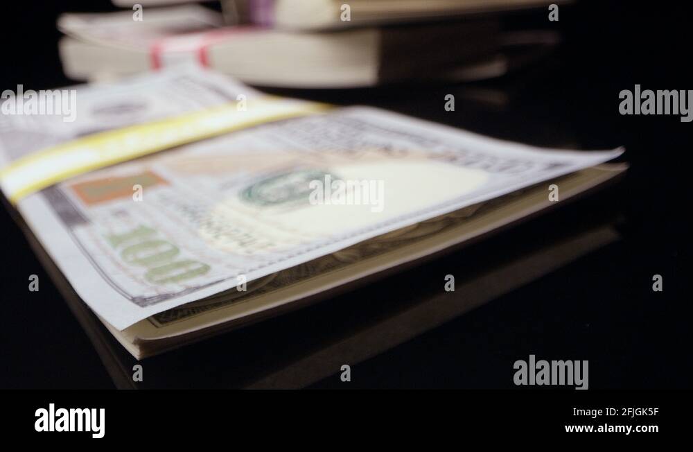 Money stacked up Stock Videos & Footage - HD and 4K Video Clips - Alamy