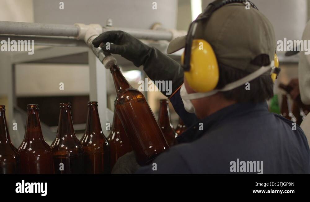 Various angles and shots of beer bottles in a brewery Stock Video ...