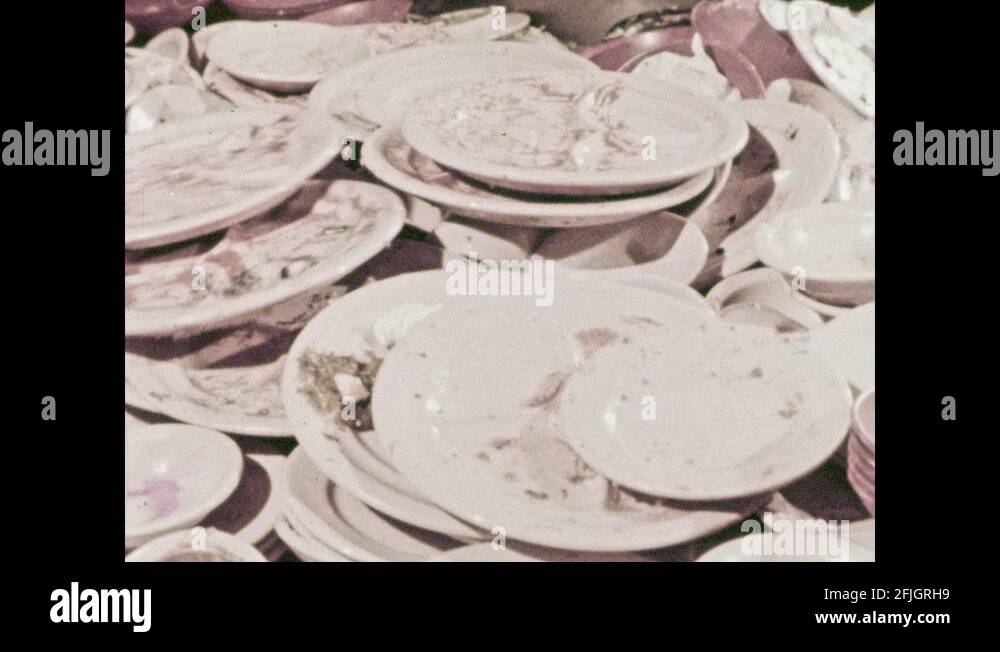 Pile dishes table Stock Videos & Footage - HD and 4K Video Clips - Alamy