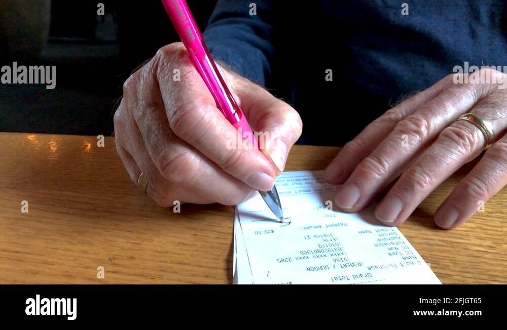 Signing a receipt Stock Videos & Footage - HD and 4K Video Clips - Alamy