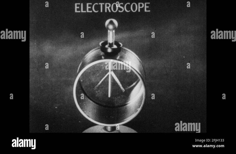 1930s: Device called the electroscope. Hand adjusts knob on ...