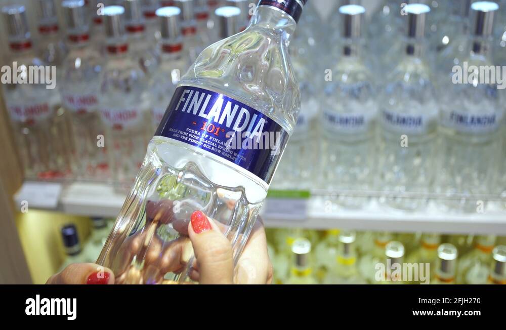 female hand holding bottle of vodka Finlandia Stock Video Footage - Alamy