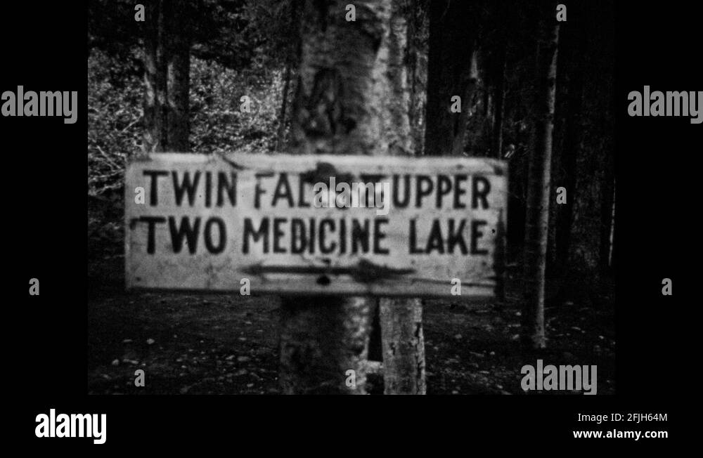 1940s: UNITED STATES: sign for Twin Falls and Upper Two Medicine Lake ...