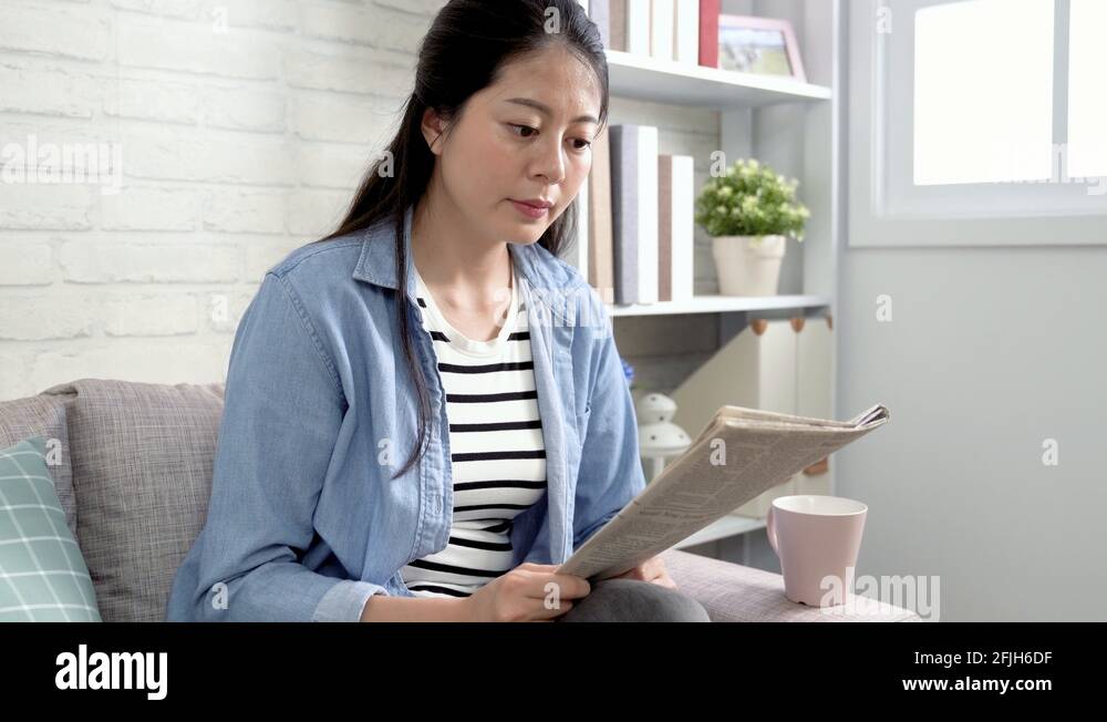 Office lady reading newspaper Stock Videos & Footage - HD and 4K Video ...