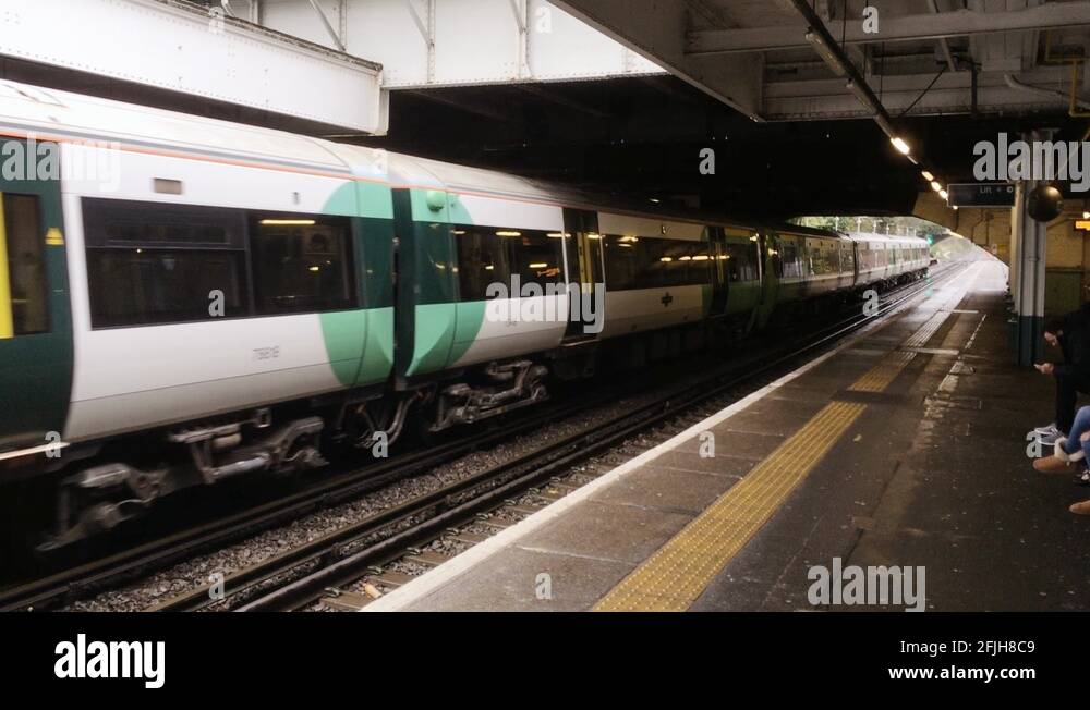 Suburb train station Stock Videos & Footage - HD and 4K Video Clips - Alamy