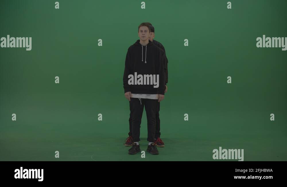 Three boys break dance in a green screen background Stock Video Footage ...