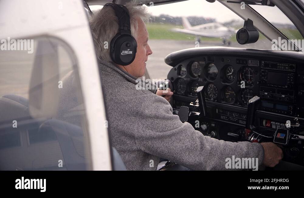 Pilot Checking Instruments and Settings Before Airplane Takeoff Stock ...