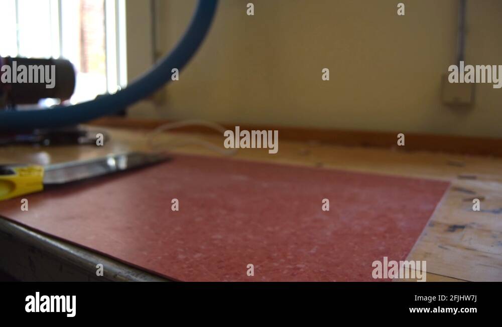 Hobby hand saw in a tool hardware workshop on a cutting table, with ...