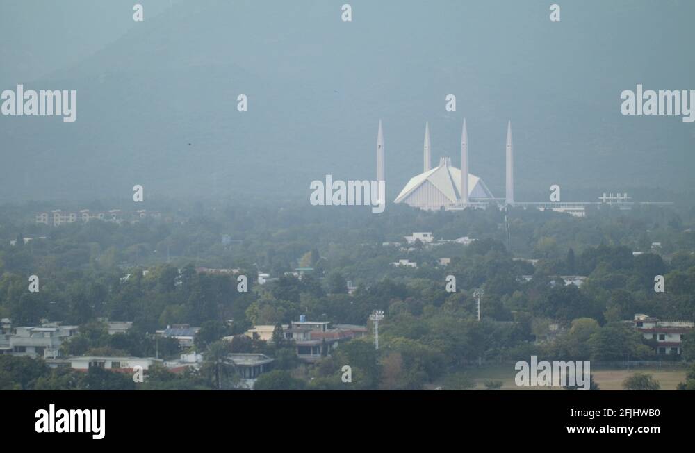 Famous Faisal Mosque in Islamabad, Pakistan, Margalla hills can be seen ...