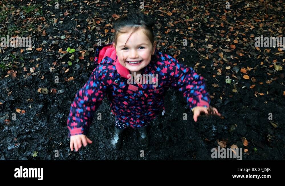 Young girl jumping in puddle Stock Videos & Footage - HD and 4K Video ...
