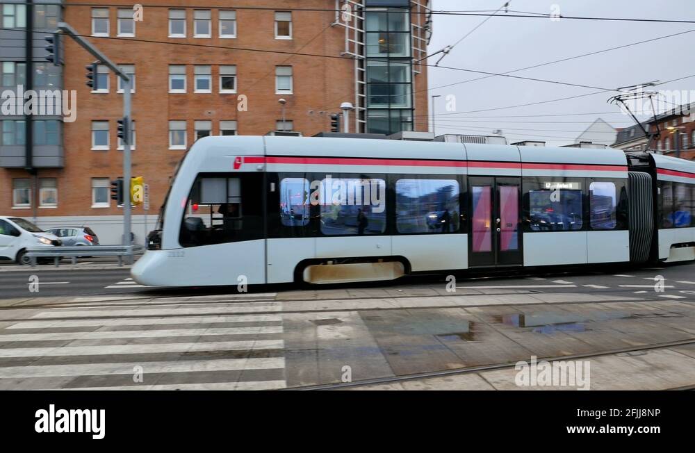 Modern light rail line running through the streets in a city Stock ...