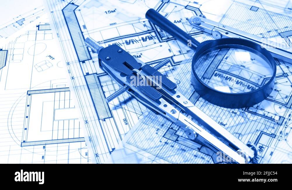 Blueprints - architectural drawings, loupe - magnifying glass and ...