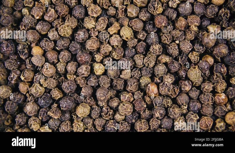 Background black pepper top view Stock Video Footage - Alamy