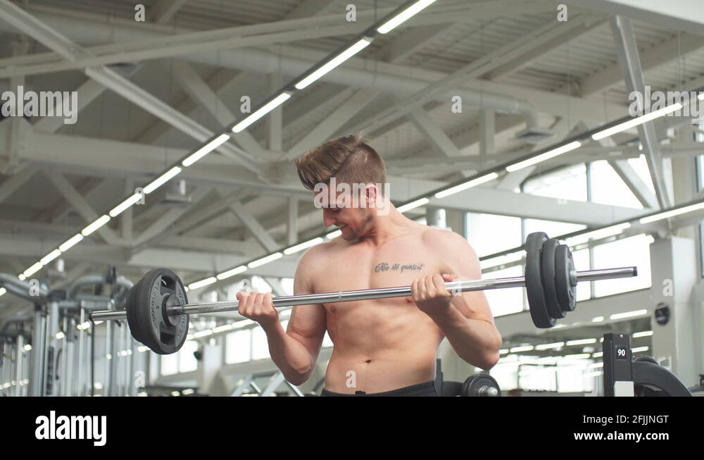 Man flexing muscles Stock Videos & Footage - HD and 4K Video Clips - Alamy