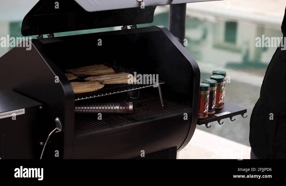 Bbq smoker hand Stock Videos & Footage - HD and 4K Video Clips - Alamy