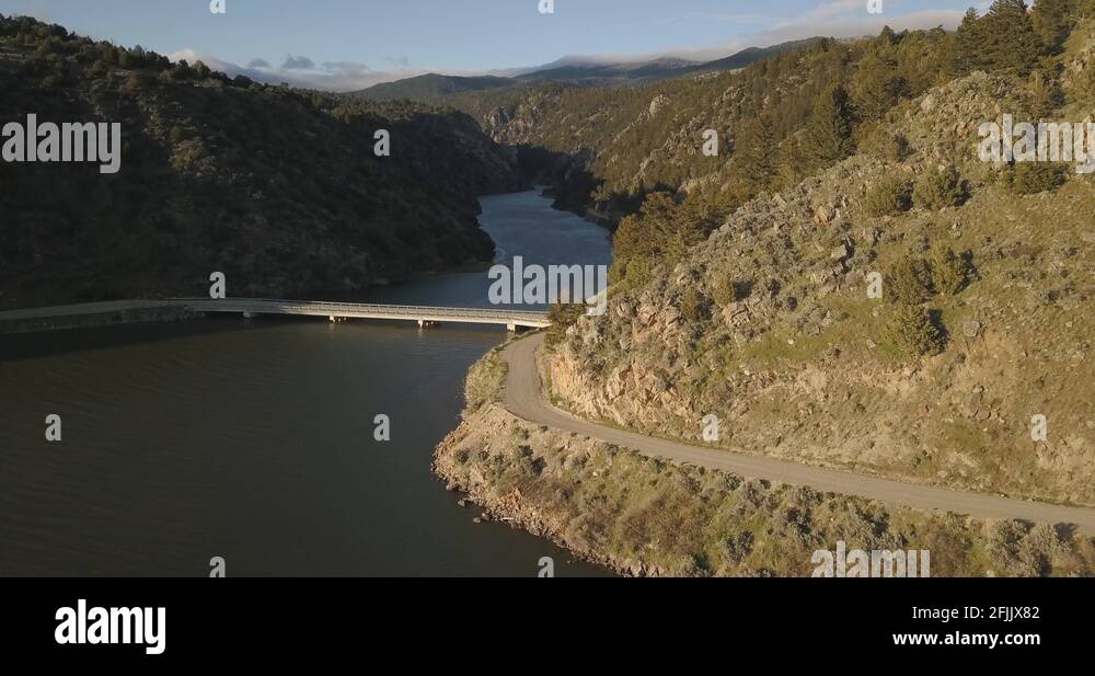 Breathtaking countryside water bridge landscape narrow edge road at ...