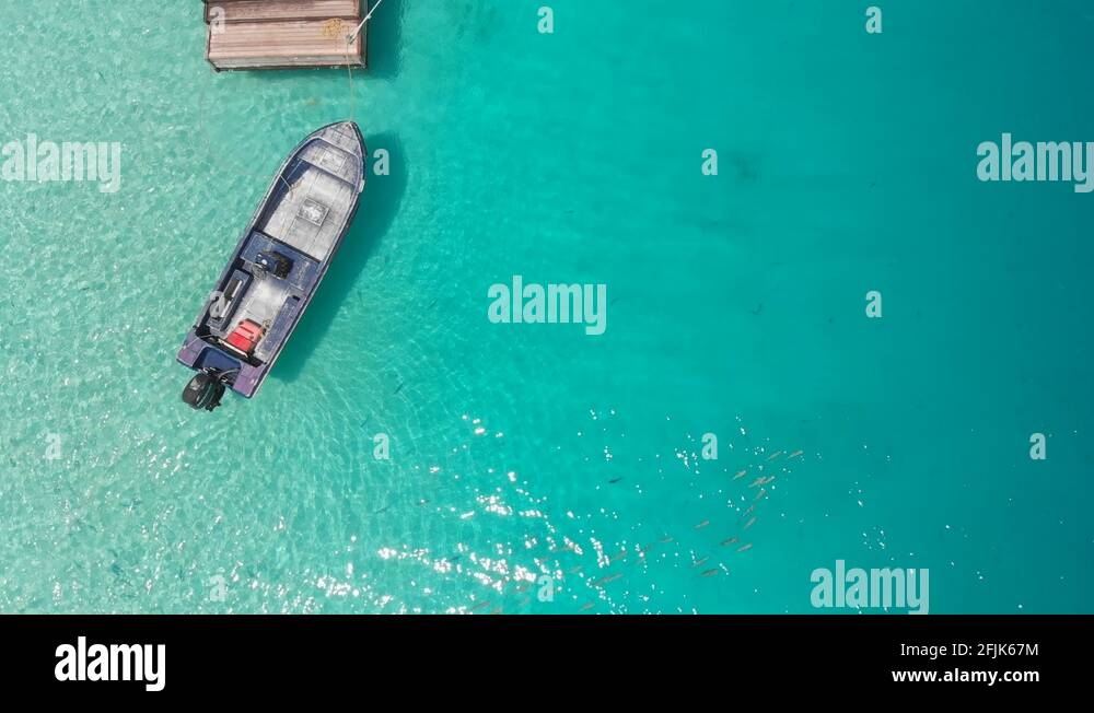 Ariel Footage of Boat in the Maldives Stock Video Footage - Alamy