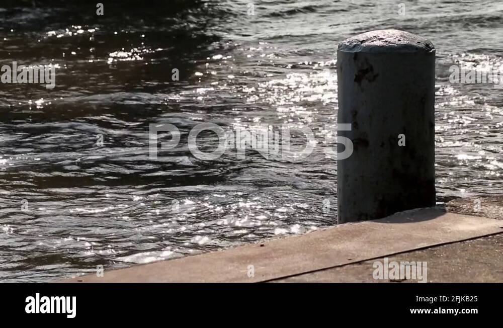 Rusted mooring post and floating concrete dock. Beautiful and peaceful ...