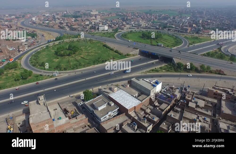 Aerial fly over or a new section of Lahore's new Ring Road in Pakistan ...