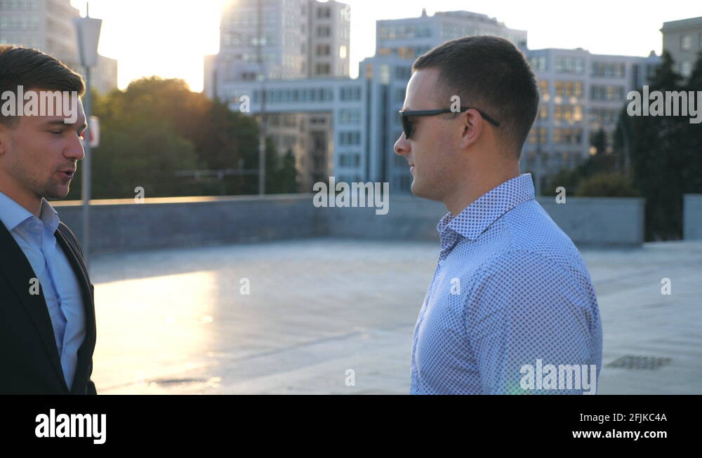 Meet two men Stock Videos & Footage - HD and 4K Video Clips - Alamy