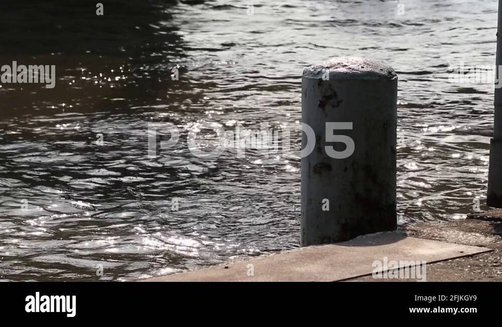 Rusted mooring post and floating concrete dock. Beautiful and peaceful ...