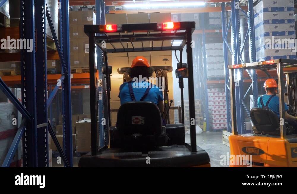 breach of safety at a warehouse by a loader Stock Video Footage - Alamy