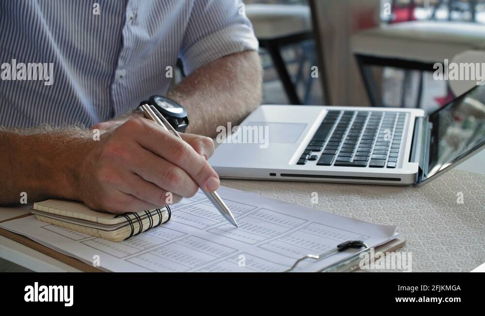 Calculating figures Stock Videos & Footage - HD and 4K Video Clips - Alamy