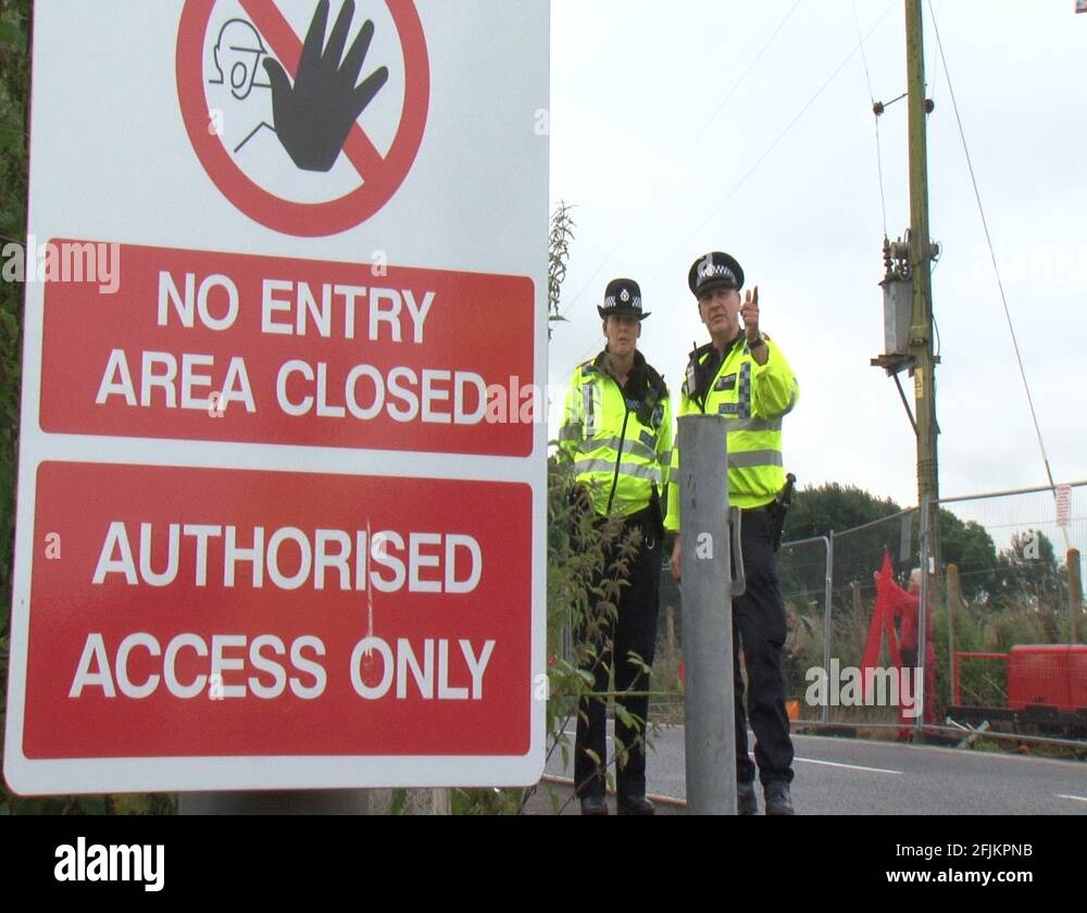No Entry Authorised Access only sign with Police guarding Stock Video ...