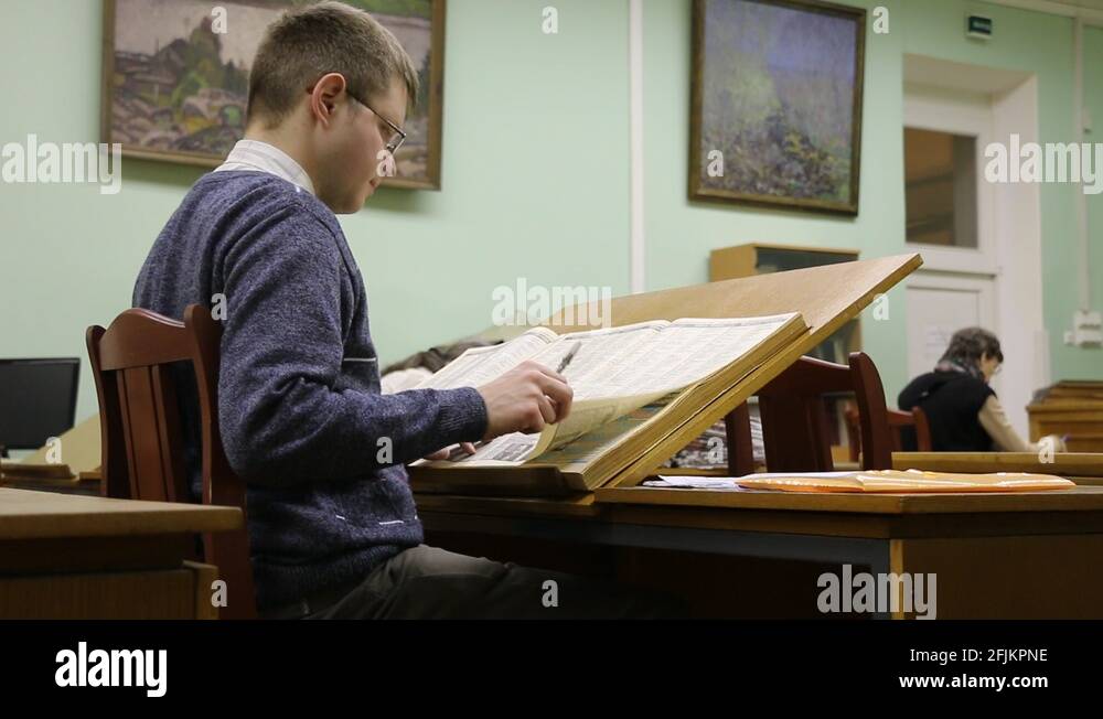 Student reading newspaper library Stock Videos & Footage - HD and 4K ...