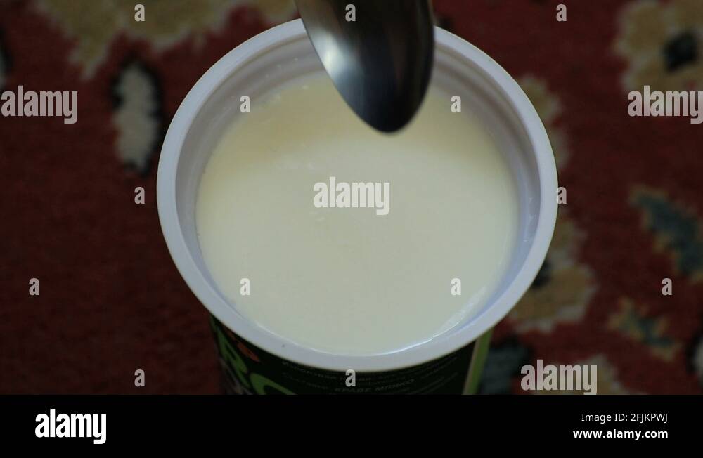 Open yogurt cup Stock Videos & Footage - HD and 4K Video Clips - Alamy